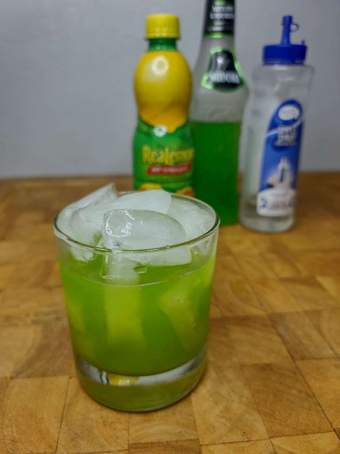 The Best Midori Sour: a sour green drink | Occasional Cocktails